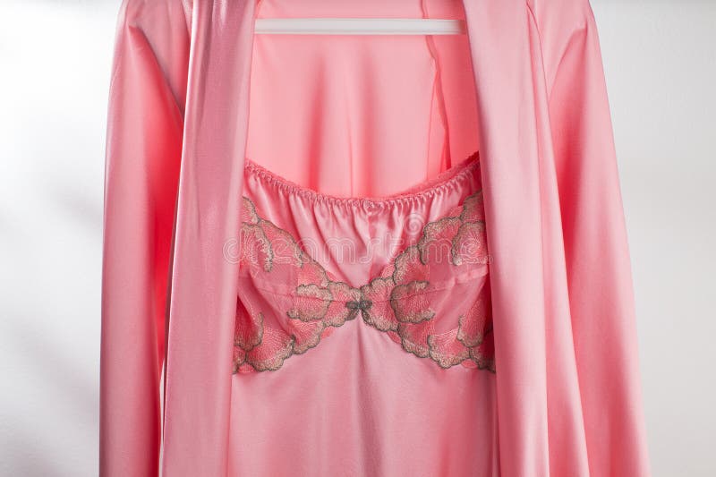Satin Babydoll Nightwear and Light Orange Satin Robe Stock Photo ...