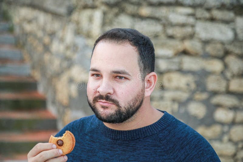 Satisfied Smile after Delicious Biscuit Bite Stock Image - Image of ...