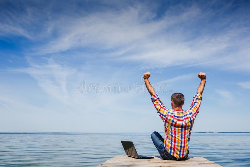 Satisfied with Work Done. Happy Young Man Working on Laptop Stock Image ...