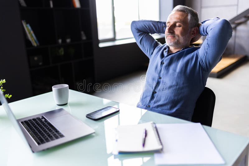 Satisfied with Work Done. Happy Young Man Working on Laptop while ...