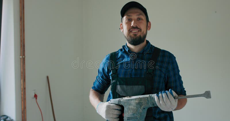 Satisfied Worker Performs Home Bathroom Demolition, General Apartment ...