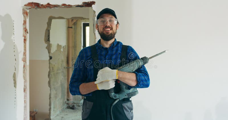 Satisfied Worker Performs Home Bathroom Demolition, General Apartment ...