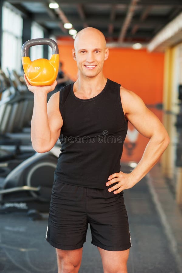 Satisfied Young Strength Man Lifting Weights Stock Image - Image of ...