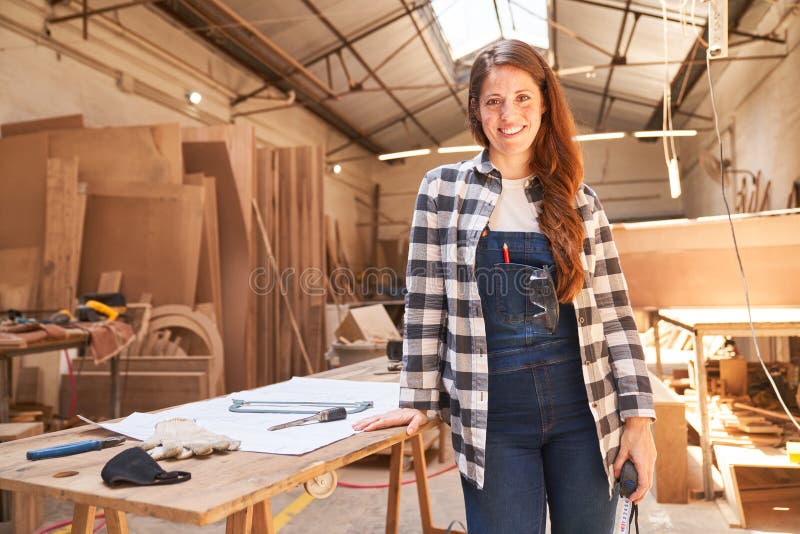 Satisfied Young Woman As a Carpenter Apprentice Stock Image - Image of ...