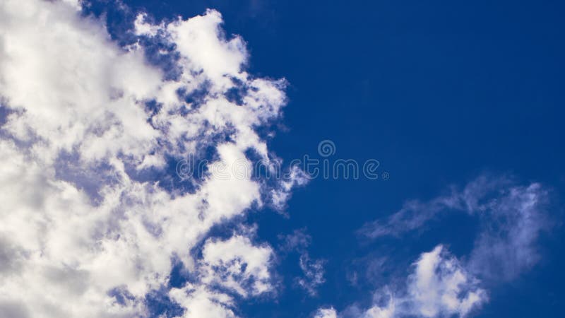 Saturated Blue Sky with Partial Clound Coverage for Backgrounds and ...