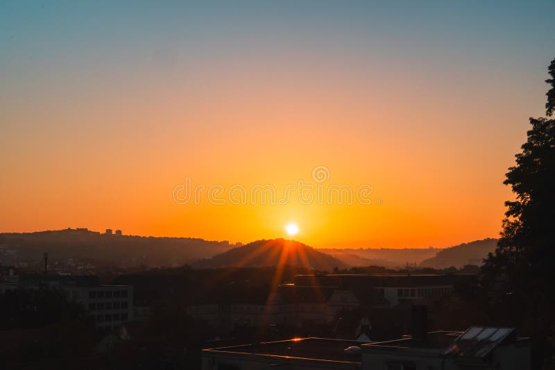 Saturated Orange Sunlight Lighting Up the Sky Softly Stock Image ...