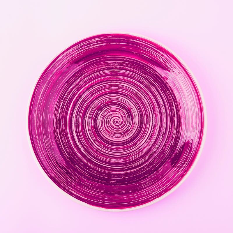 Saturated Plum Color Plate on the Light Pink Background Stock Photo ...