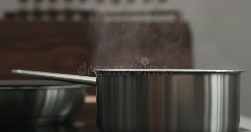 A Saucepan of Boiling Water Stock Photo - Image of crockpot, kitchen ...