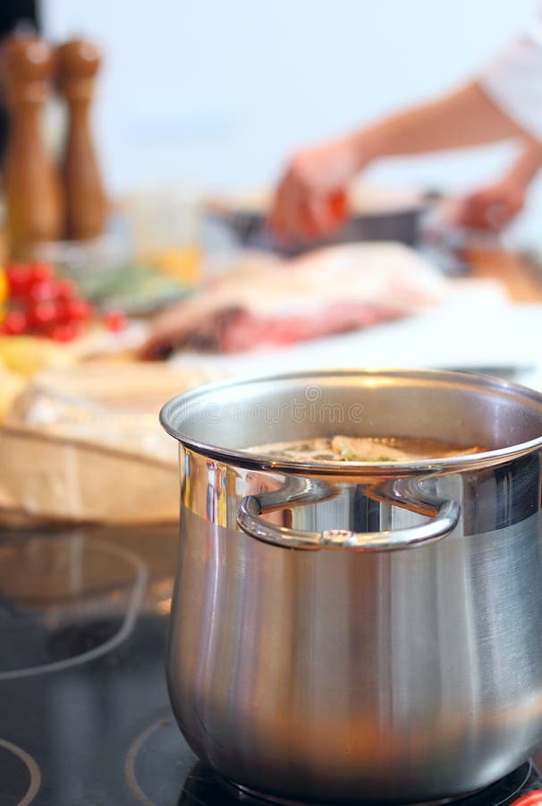 Saucepan with soup stock photo. Image of person, cooking - 28731828
