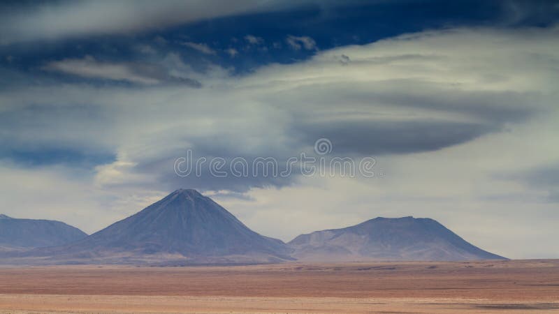 Saucer Clouds Over the Volcano Licancabur Stock Image - Image of chile ...