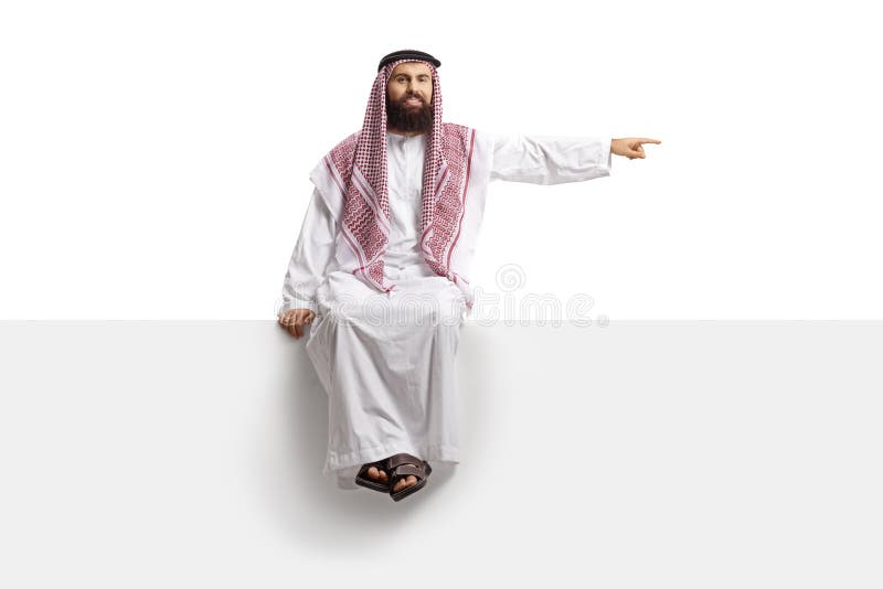Saudi Arab Man Sitting on a Blank Panel and Pointing Stock Image ...