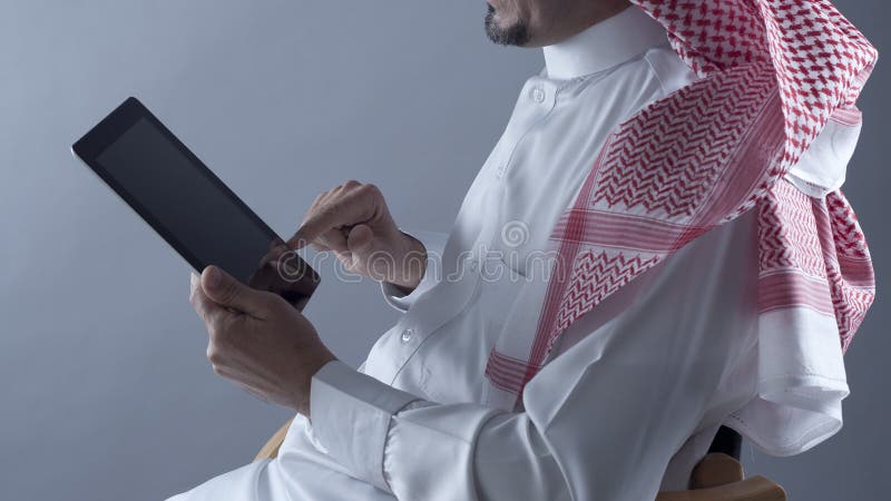 Saudi Arabian Man Hands Holding Tablet Stock Photo - Image of mobile ...