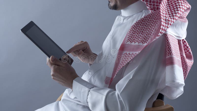Saudi Arabian Man Hands Holding Tablet Stock Photo - Image of interface ...