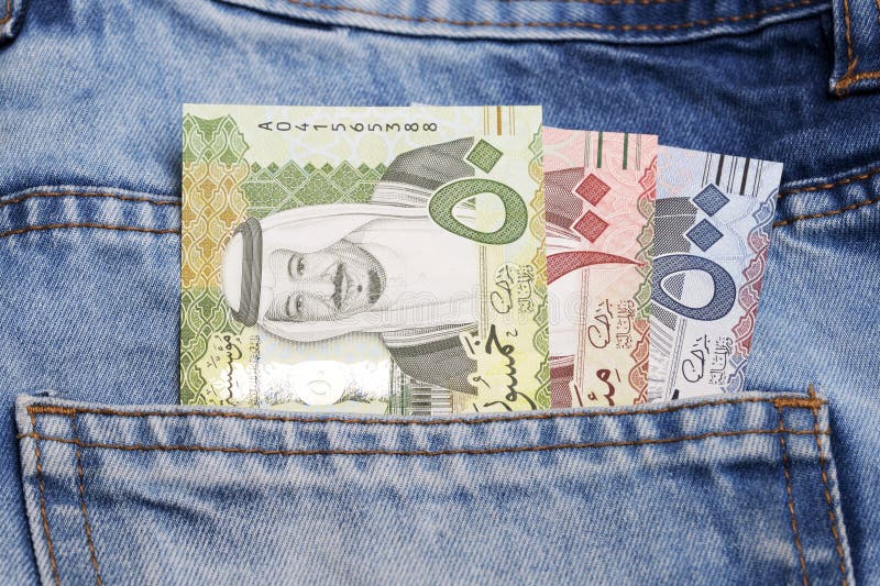 Saudi Riyal in the Pocket of Blue Jeans Stock Image - Image of finance ...