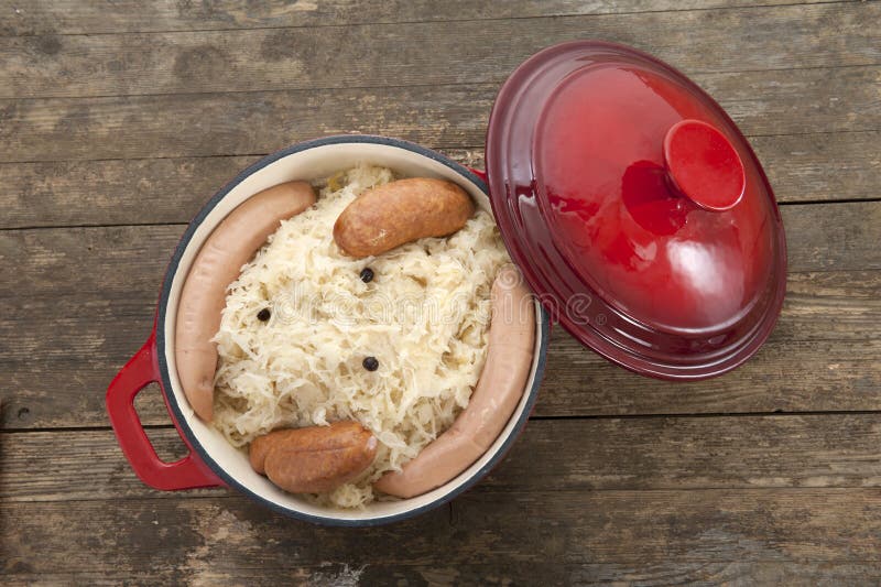 Sauerkraut in red stew pot stock photo. Image of food - 23306098
