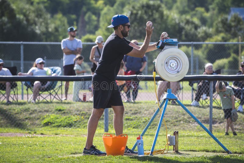 Baseball Softball Pitching Machine Pitch Stock Photos - Free & Royalty ...