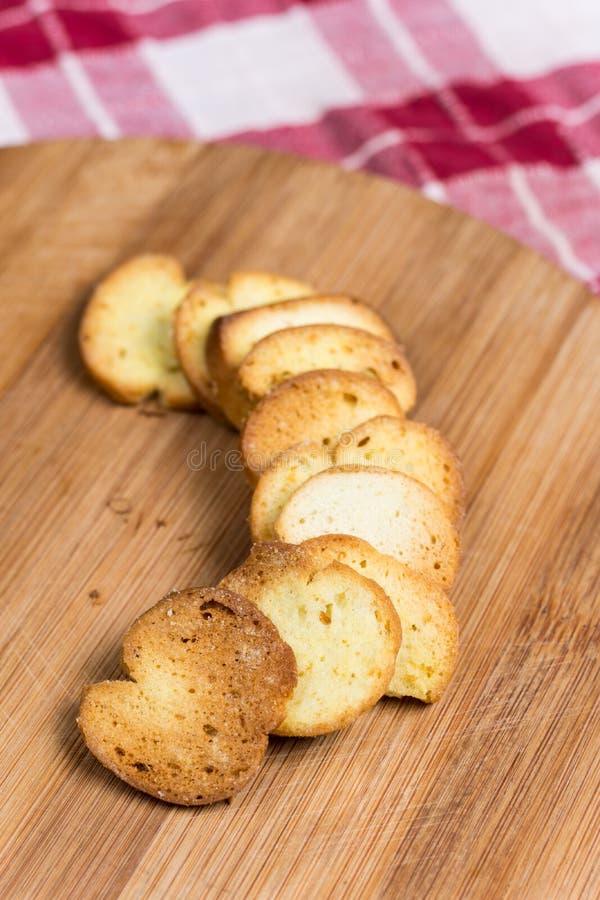 Saulty Crispy Little Toast Breads on the Wooden Board Stock Photo ...
