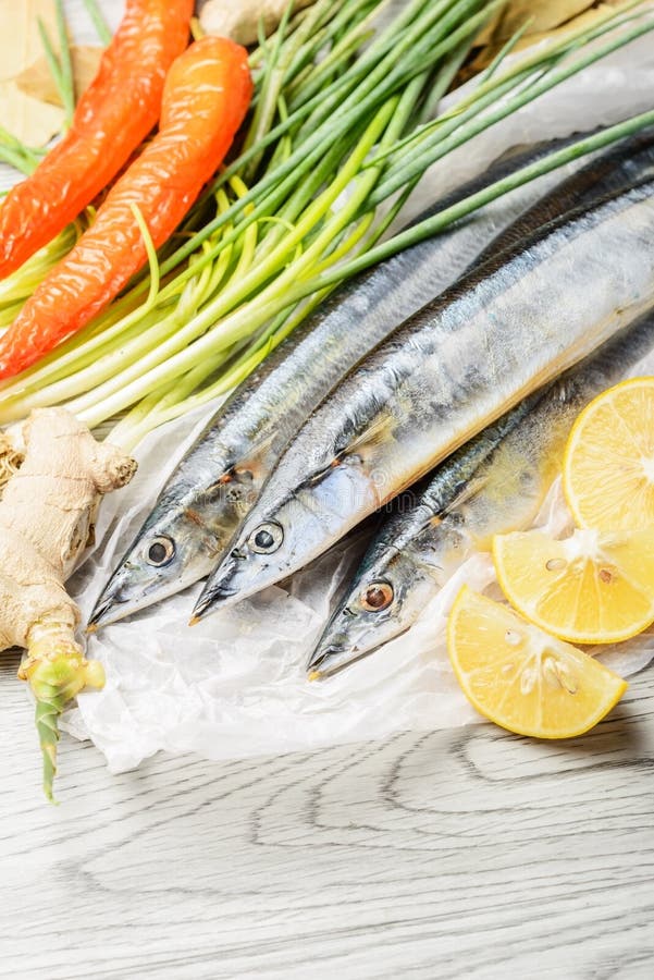 Saury fish and vegetable stock image. Image of close - 58844123