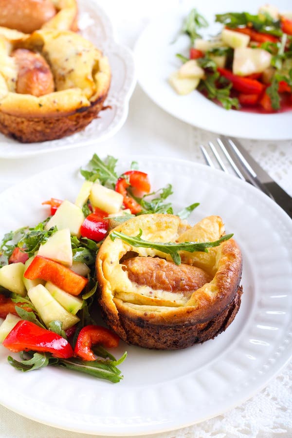 Sausage and Apple Toad in the Hole Stock Photo - Image of rocket, snack ...