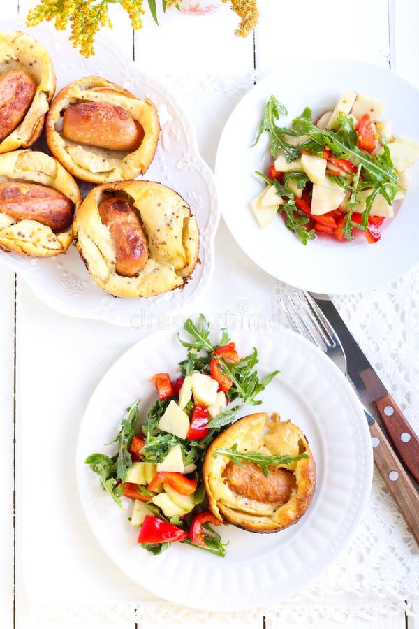 Sausage and Apple Toad in the Hole Stock Photo - Image of pepper ...