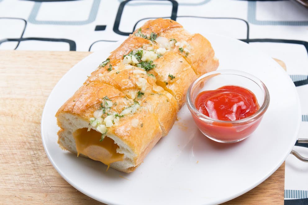 Sausage bread with ketchop stock image. Image of color - 77544563