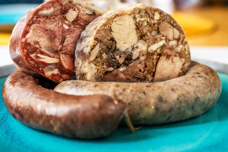 Sausage, Bright and Black Pudding with Nice Texture on Blue Plate Stock ...