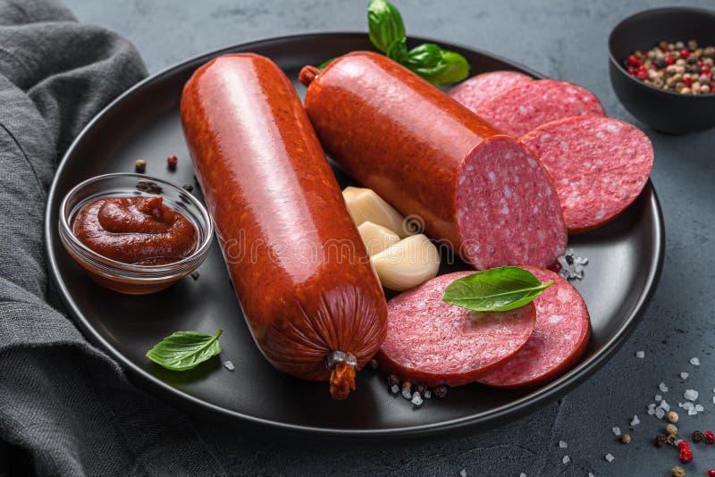 Sausage Close-up on a Black Plate. Side View Stock Photo - Image of ...