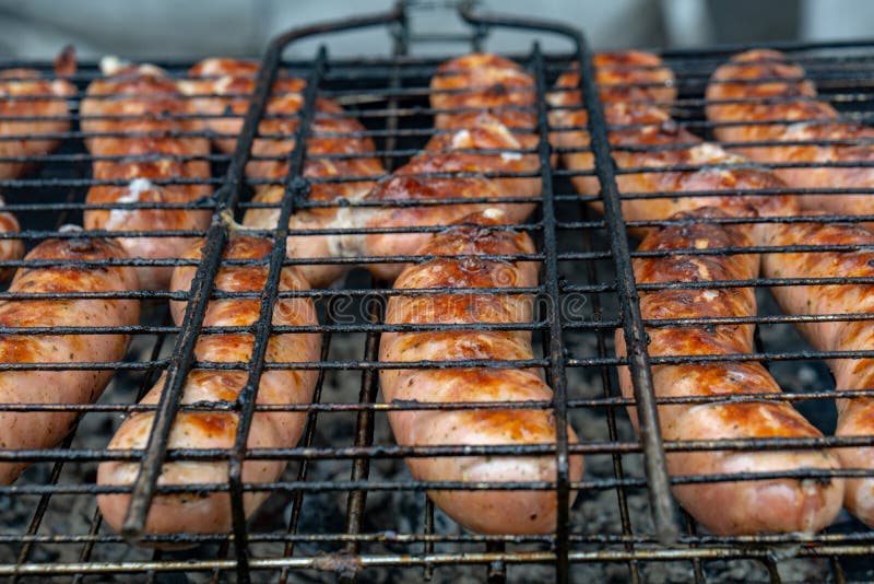 Sausage on the grill stock image. Image of cooking, barbecue - 163166265