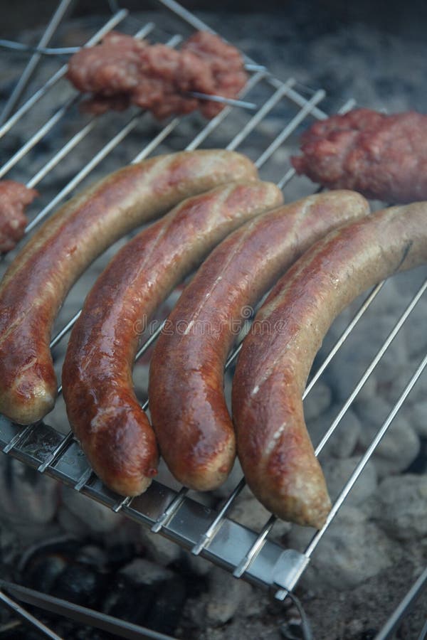 Sausage on the grill stock photo. Image of colddish - 189057716
