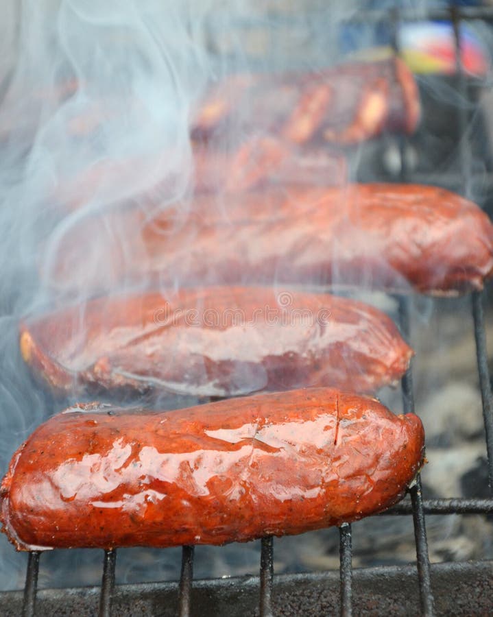 Sausage on a grill stock image. Image of cook, grill - 39829211