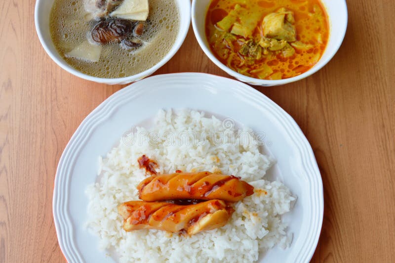 Sausage on Rice with Bamboo Shoot Curry and Soup Stock Image - Image of ...