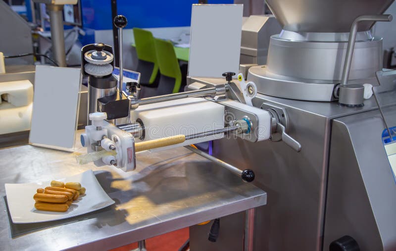 Sausage stuffing machine stock photo. Image of meal - 142937136