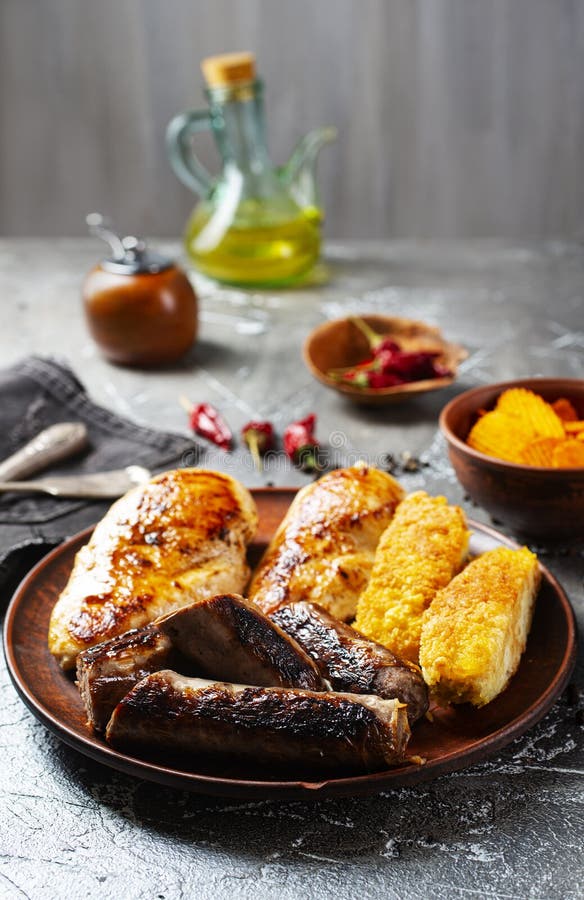 Sausages, Chicken, Fish Fried with Spices and Herbs Stock Image - Image ...