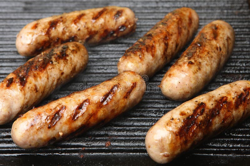 Sausages Cooking on Griddle Plate Stock Image - Image of bratwurst ...