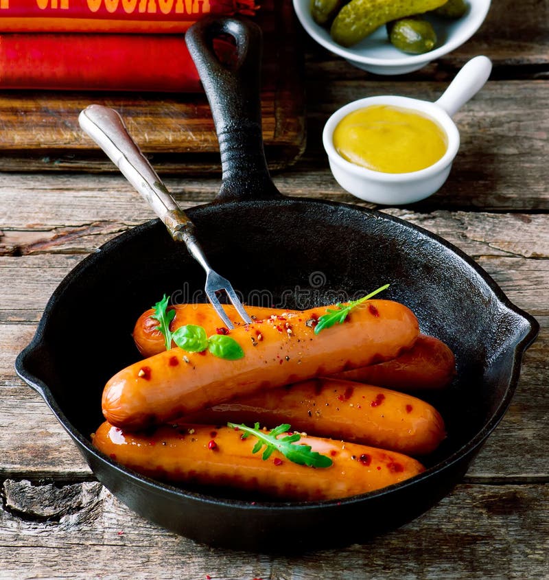 Sausages in a Pig-iron Frying Pan. Stock Image - Image of fresh, food ...