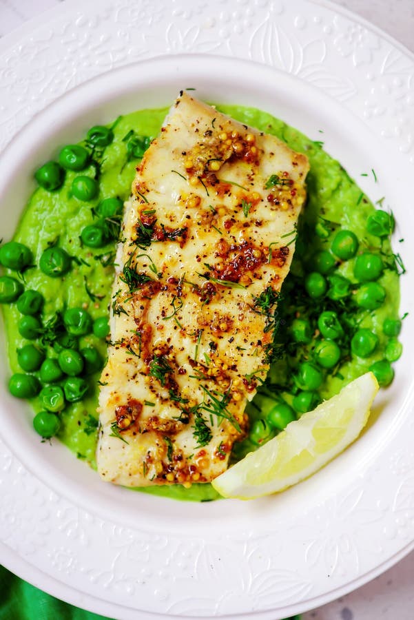 Sauteed Cod with Pea Cream..style Rustic Stock Photo - Image of cream ...