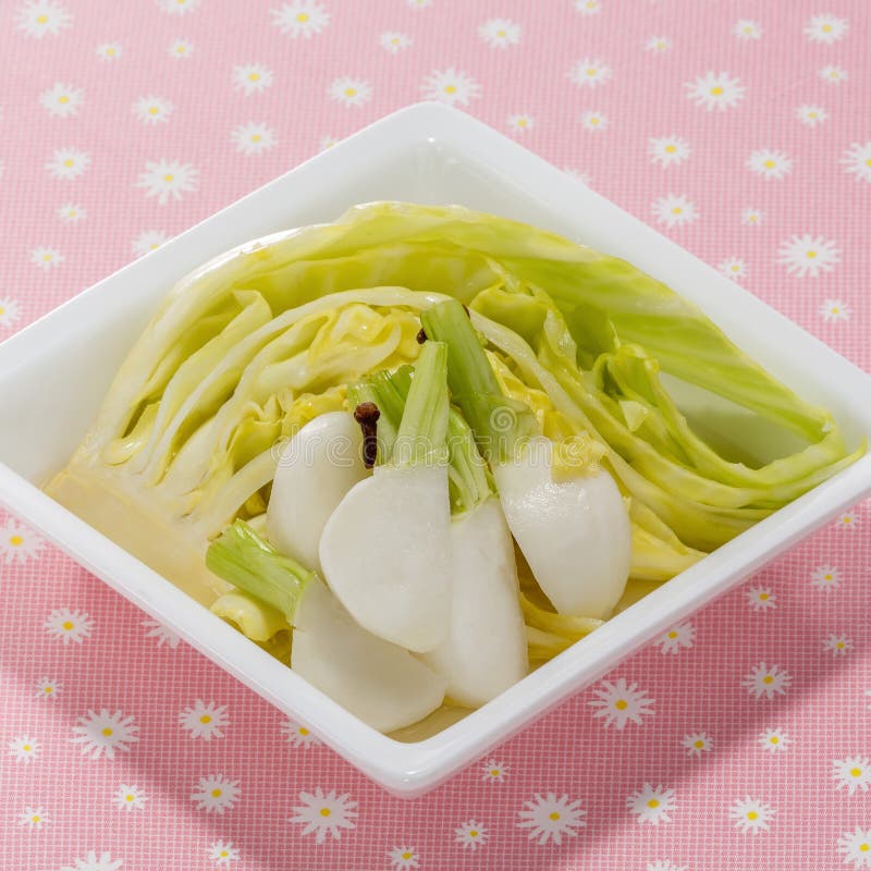 Sauteed White Radish with Cabbage on White Platter Stock Photo - Image ...