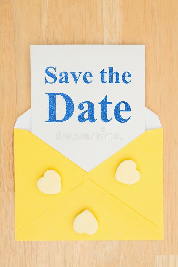 Save the Date Message on White Card and Hearts with a Yellow Envelope ...