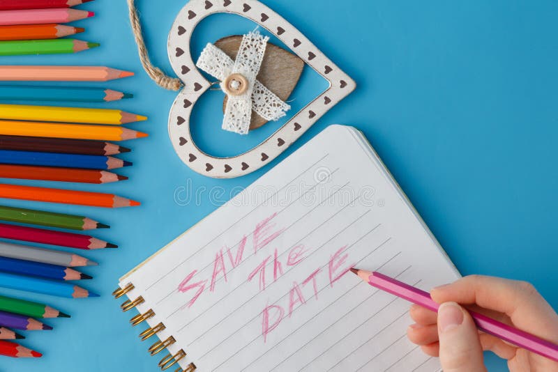 Save the Date Phrase Writing by Womans Hand in Notebook Stock Image ... Save the Date Phrase Writing by Womans Hand in Notebook Stock Image ...