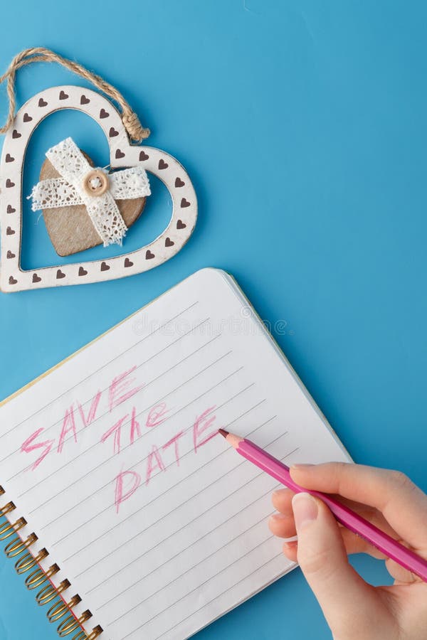 Save the Date Phrase Writing by Womans Hand in Notebook Stock Photo ... Save the Date Phrase Writing by Womans Hand in Notebook Stock Photo ...