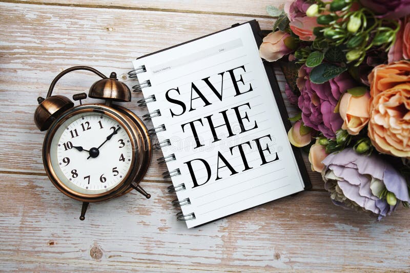 Save the Date Text on Notepad with Alarm Clock and Flower Bouquet on ...