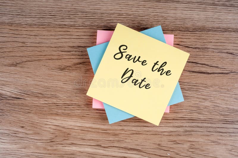 Save and Date Writing on a Pile of Yellow, Blue and Pink Colored Paper ...