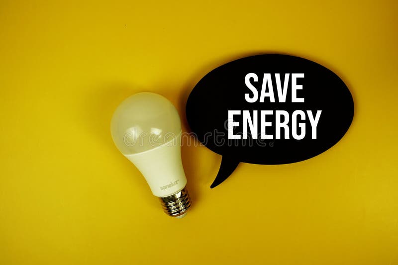 Save Energy Text on Speech Bubble with Light Bulb Top View on Yellow ...