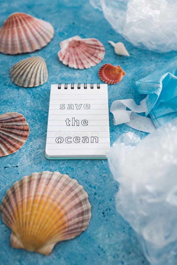 Save the Ocean Text on Blue Bakground with Sea Shells and Plastic ...