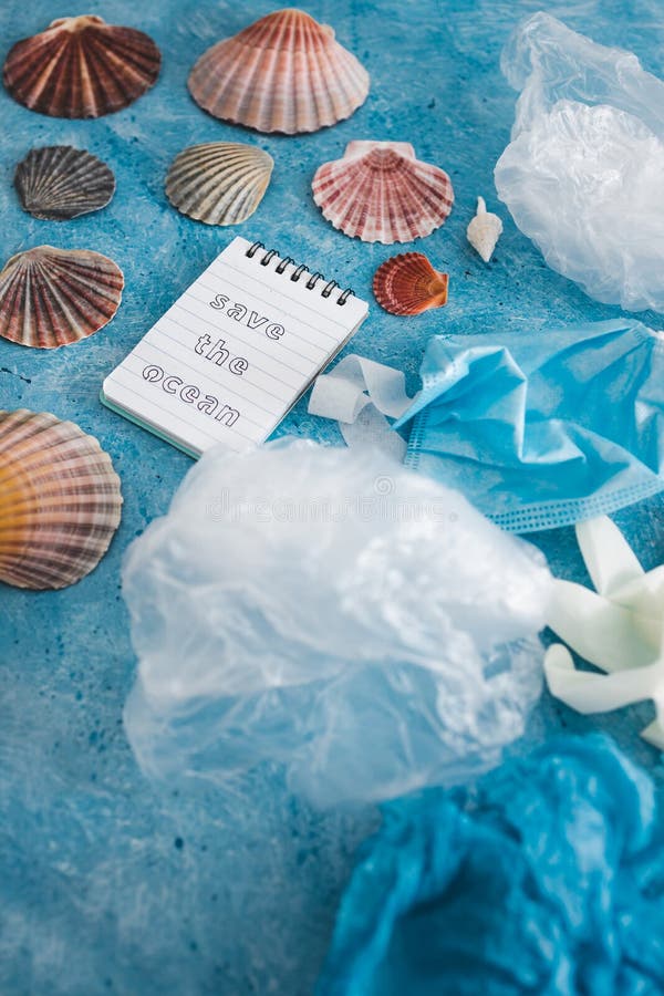 Save the Ocean Text on Blue Bakground with Sea Shells and Plastic ...