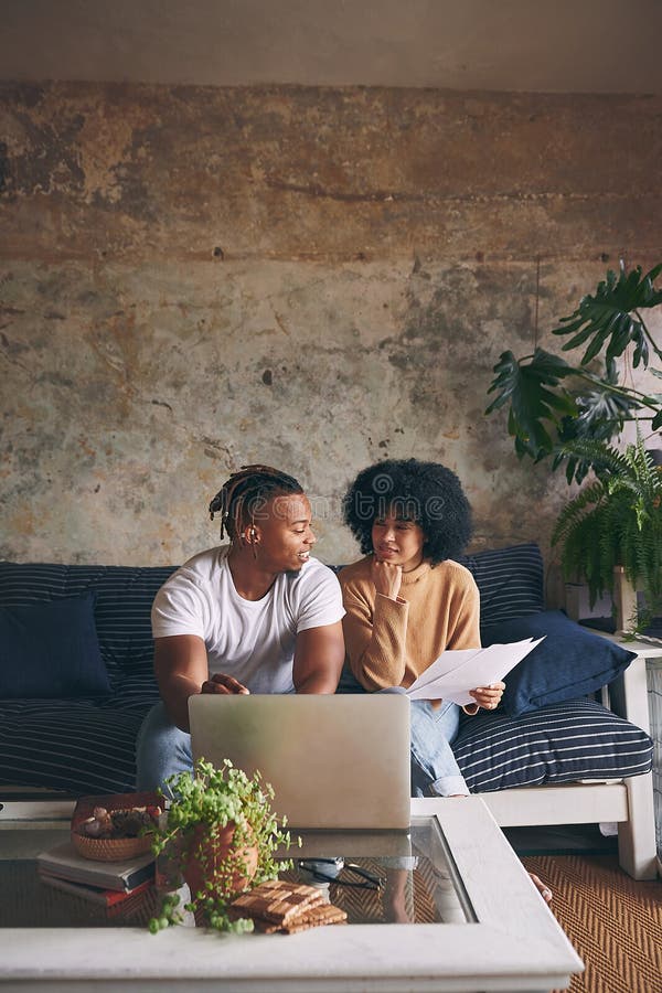 We Saved Quite a Bit this Month. a Young Couple Going through Paperwork ...