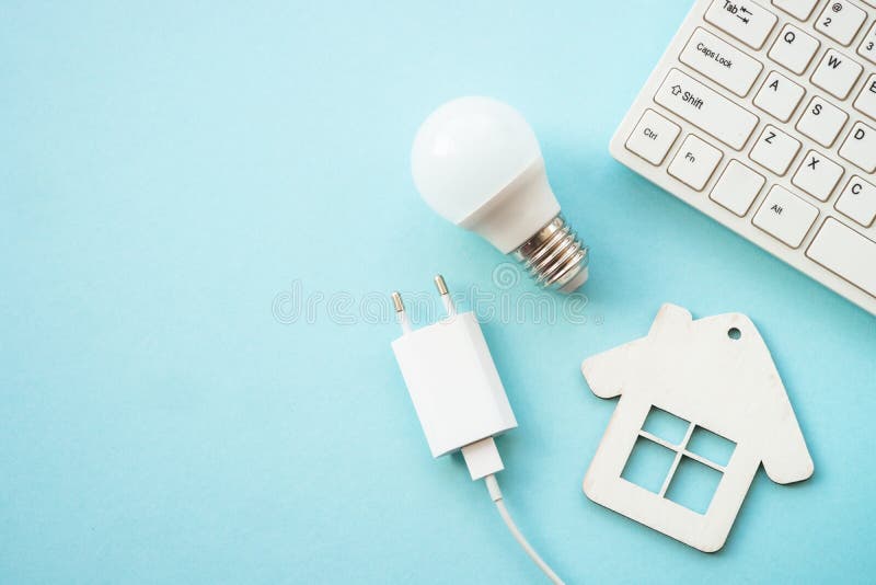 Saving Electricity. LED Lamp, Wire with Plug and House. Stock Photo ...