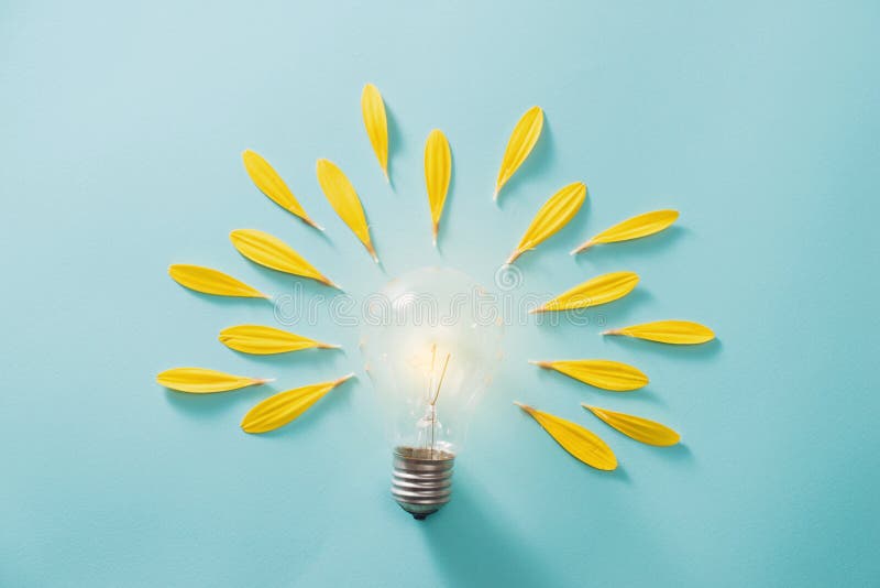 Saving Energy with Light Bulb on the Blue Background Stock Photo ...