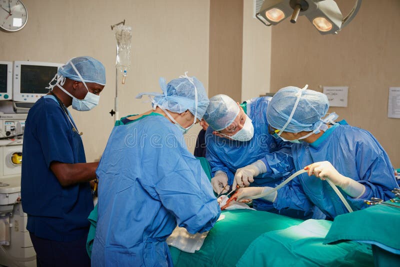 Saving Lives is Their Calling. a Team of Surgeons Performing a Surgery ...