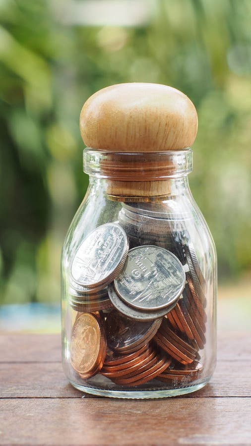 Saving money in bottle stock image. Image of business - 89938127